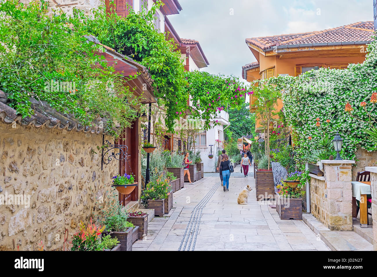 ANTALYA, TURKEY - MAY 6, 2017: The narrow streets of Kaleici are often ...