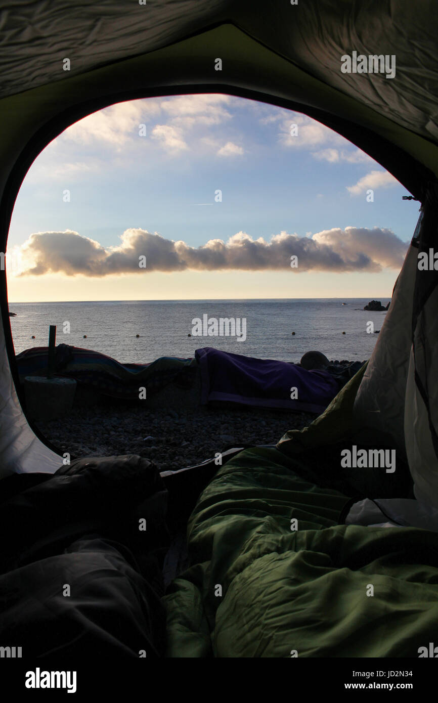Couple sleeping on the beach hi-res stock photography and images - Alamy