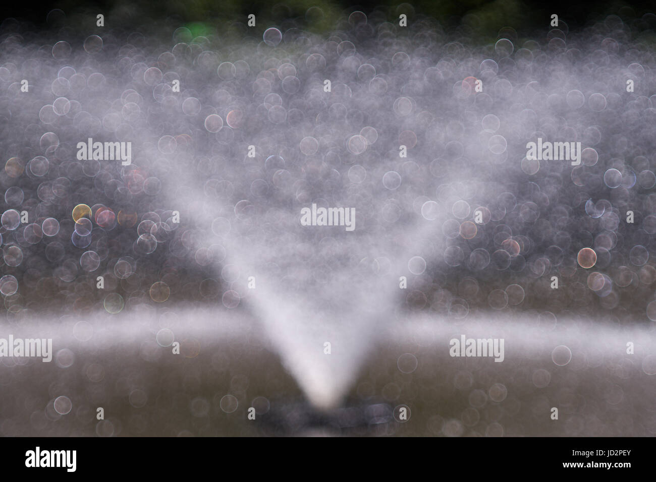 Water sprinkling hi-res stock photography and images - Alamy