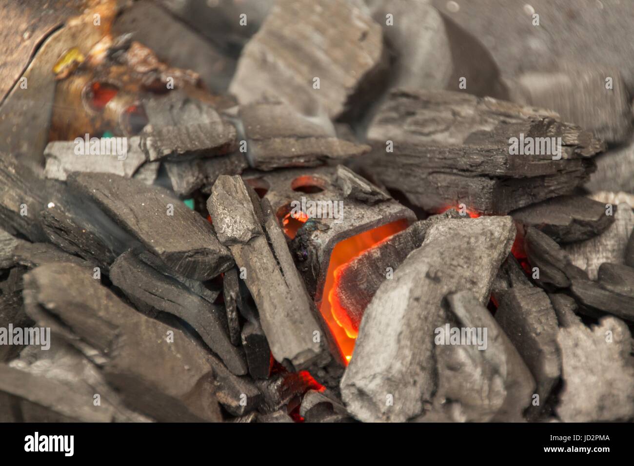 Firing coal on the grill. Barbecue Fire Grill top view Stock Photo - Alamy