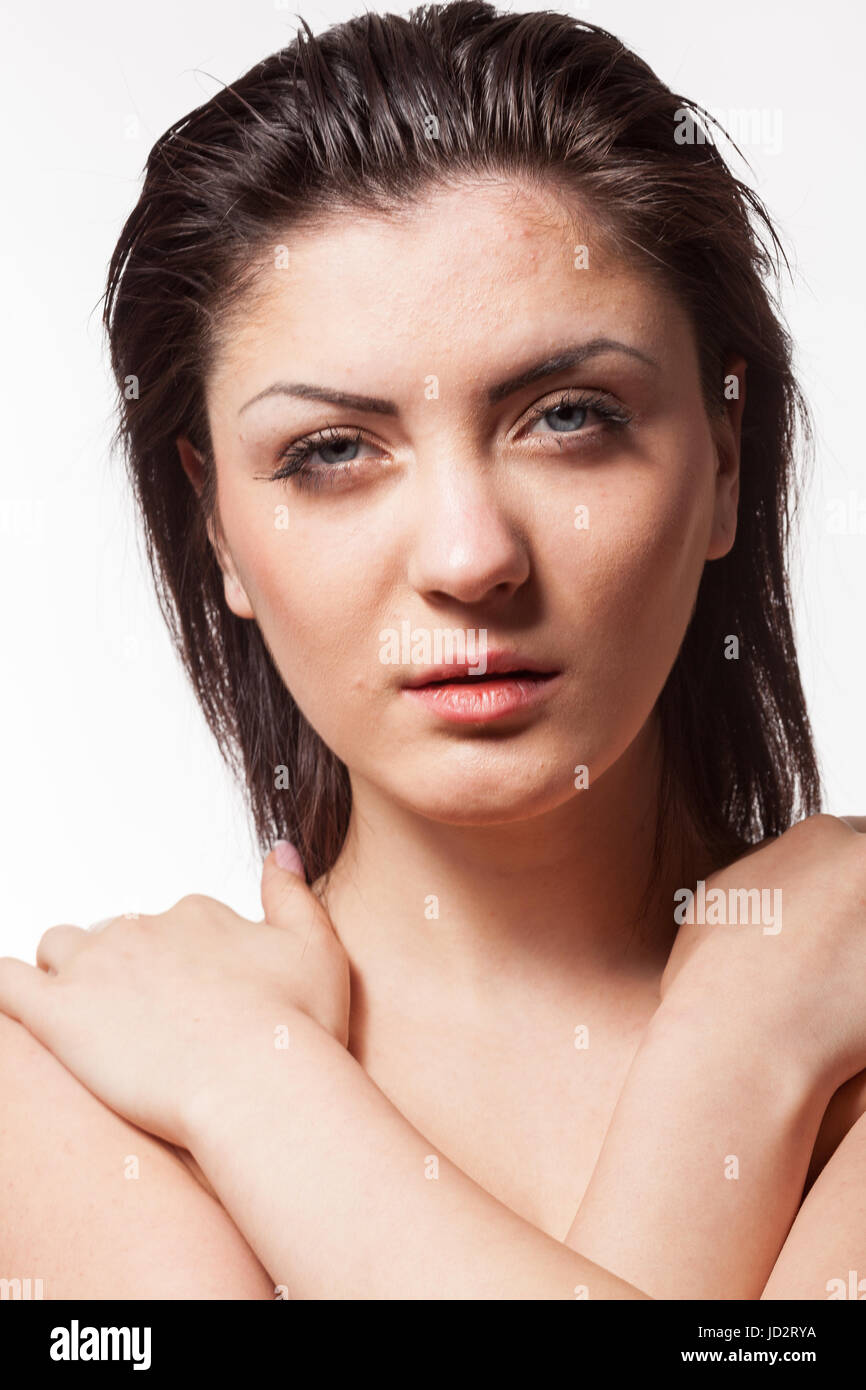 Portrait of beautiful woman in harsh studio light Stock Photo - Alamy