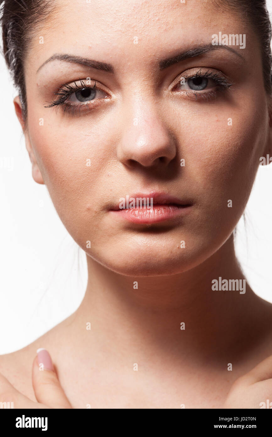 Portrait of attractive woman in harsh studio light Stock Photo - Alamy