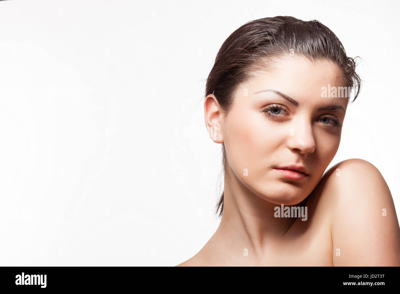 Portrait of woman in harsh studio light Stock Photo - Alamy