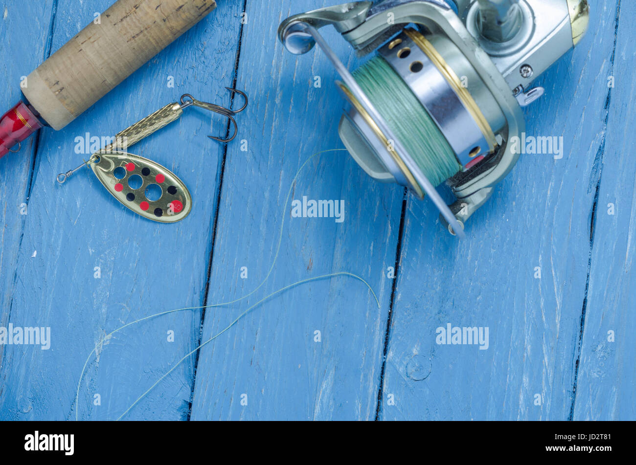 Spoon-baiting, spinning and reel. Decorative background. Fishing Stock ...