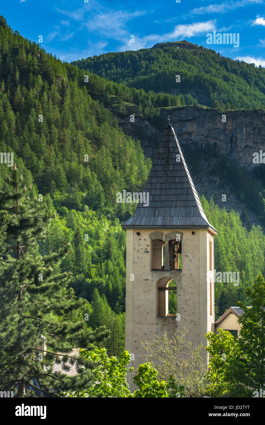 Church tower with alpine background,France Stock Photo - Alamy