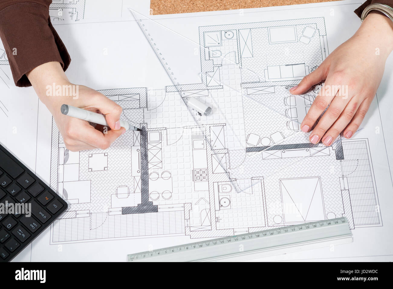 Top view of architect working at her desk Stock Photo - Alamy