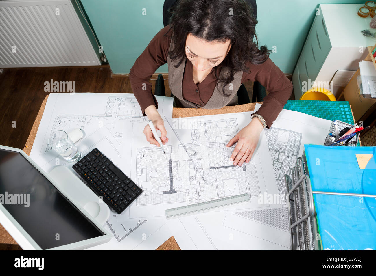 Top view of architect working at her desk Stock Photo - Alamy