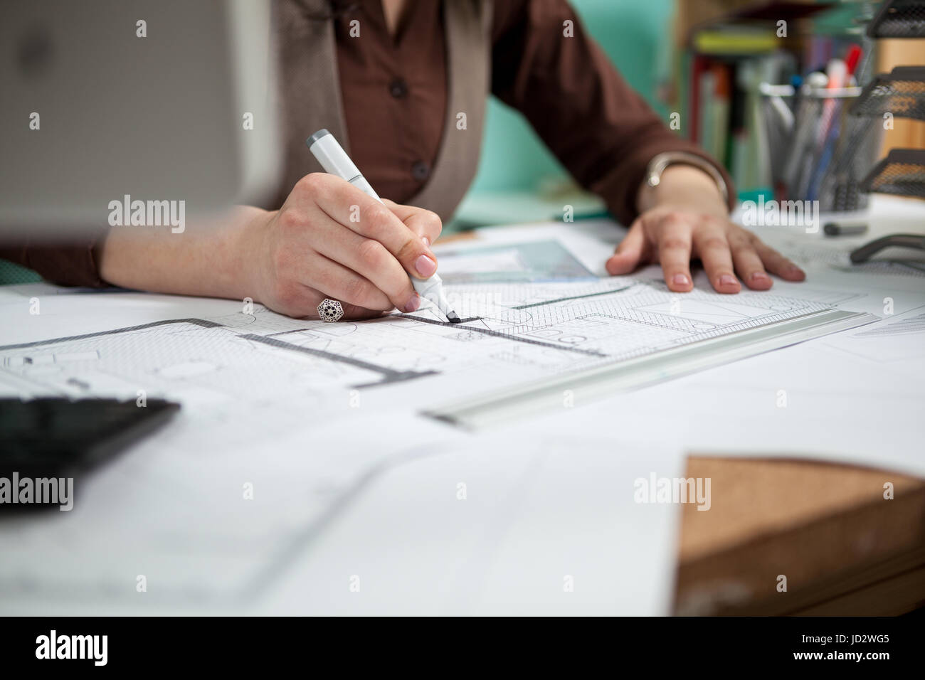 Architect at her working desk Stock Photo - Alamy