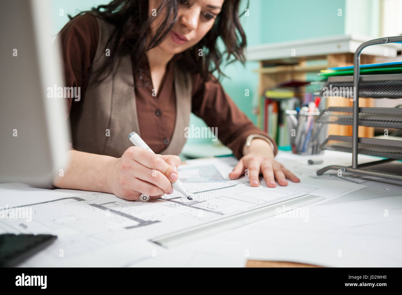 Architect at her working desk Stock Photo - Alamy