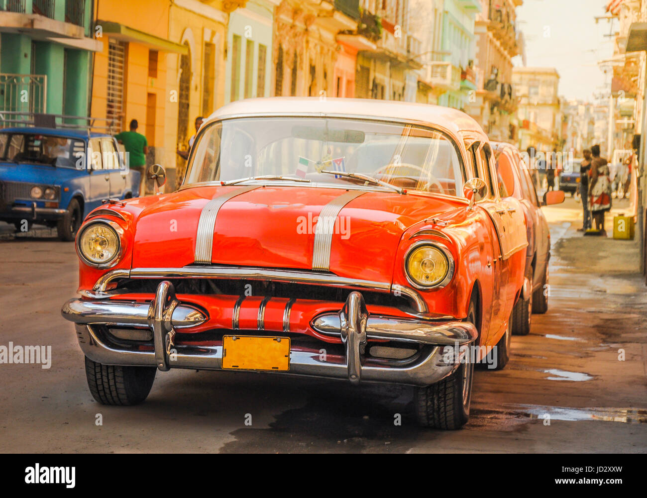 Shiny colorful vintage car in Havana street Stock Photo - Alamy