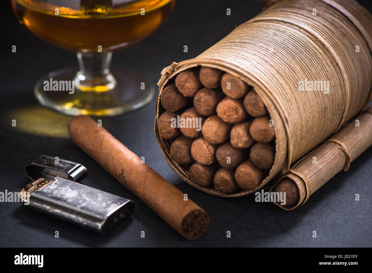 Cuban cigars in traditional cigars holder Stock Photo - Alamy