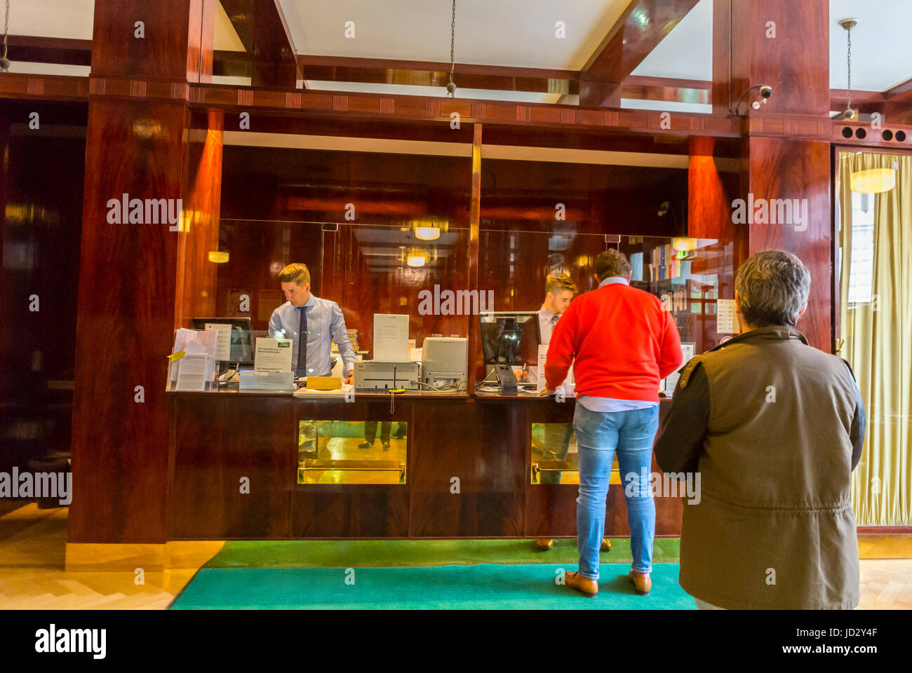 Bank interior teller hi-res stock photography and images - Alamy