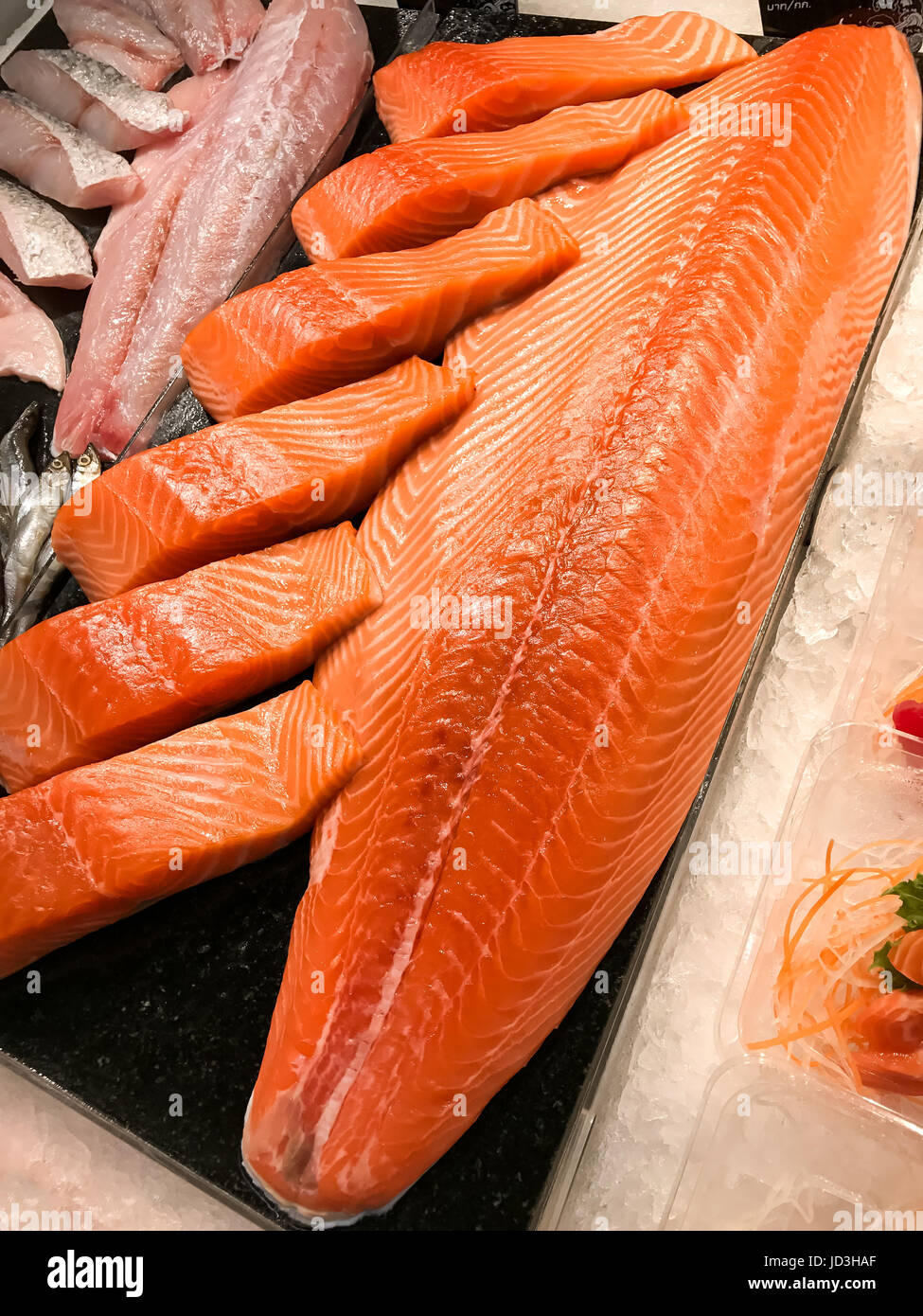 Closed up raw salmon fillet in the food shop Stock Photo - Alamy