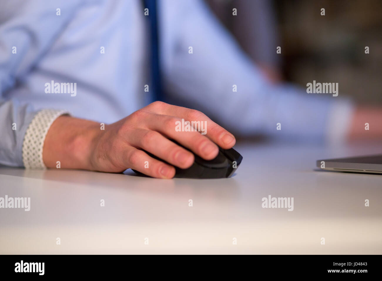 Hand using computer mouse at office closeup Stock Photo - Alamy