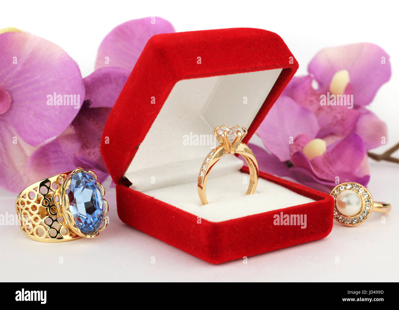 ring in jewelry box, flower background Stock Photo - Alamy