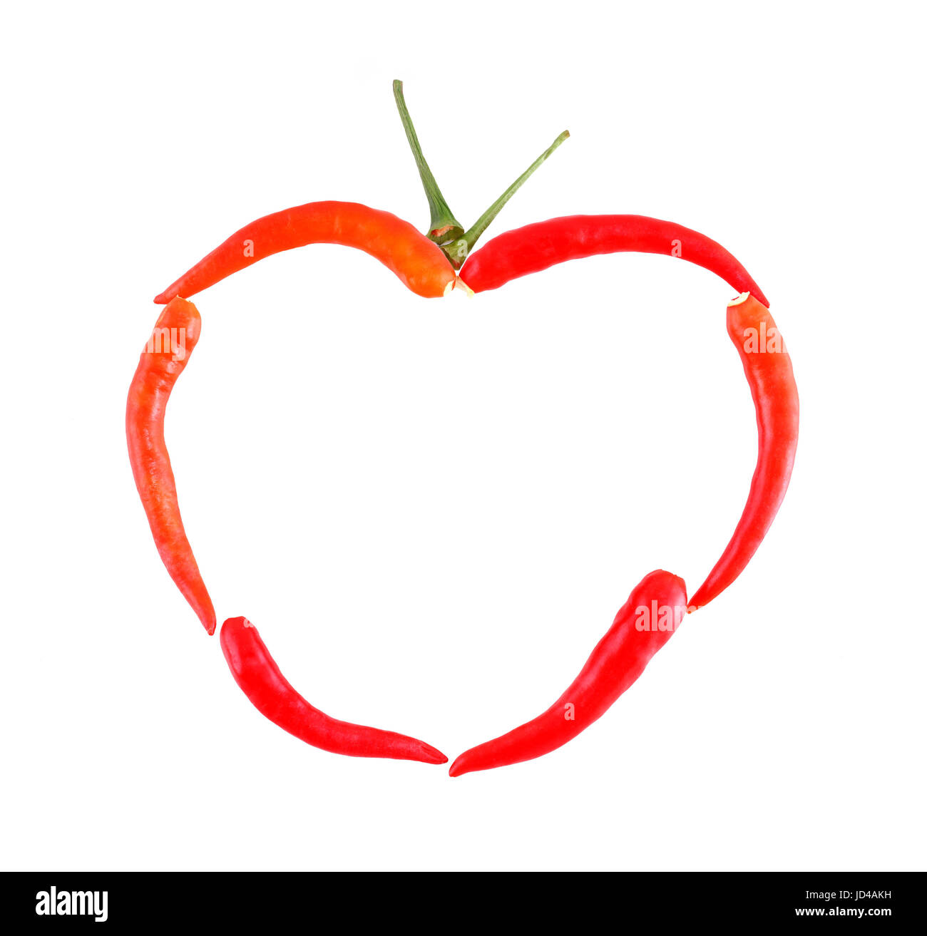Red chili pepper heart shape isolated Stock Photo - Alamy