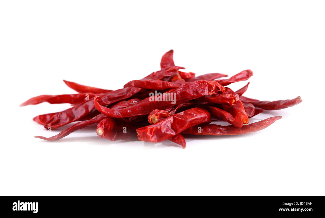 Dried big chili on white background Stock Photo - Alamy