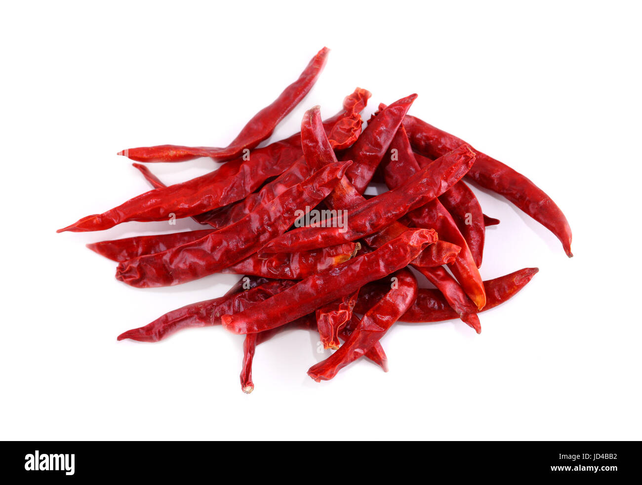 Dried big chili on white background Stock Photo - Alamy