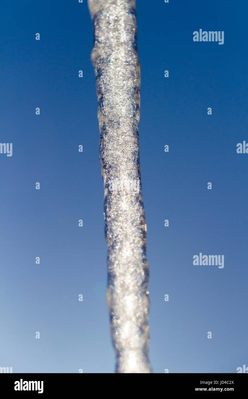 Part of a large icicle closeup Stock Photo - Alamy