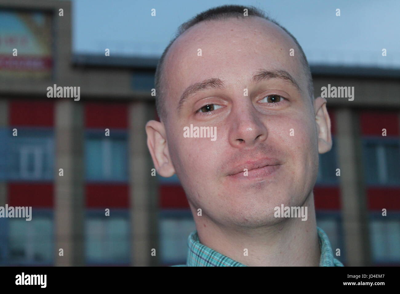 Portrait of happy man smiling outdoors Stock Photo - Alamy
