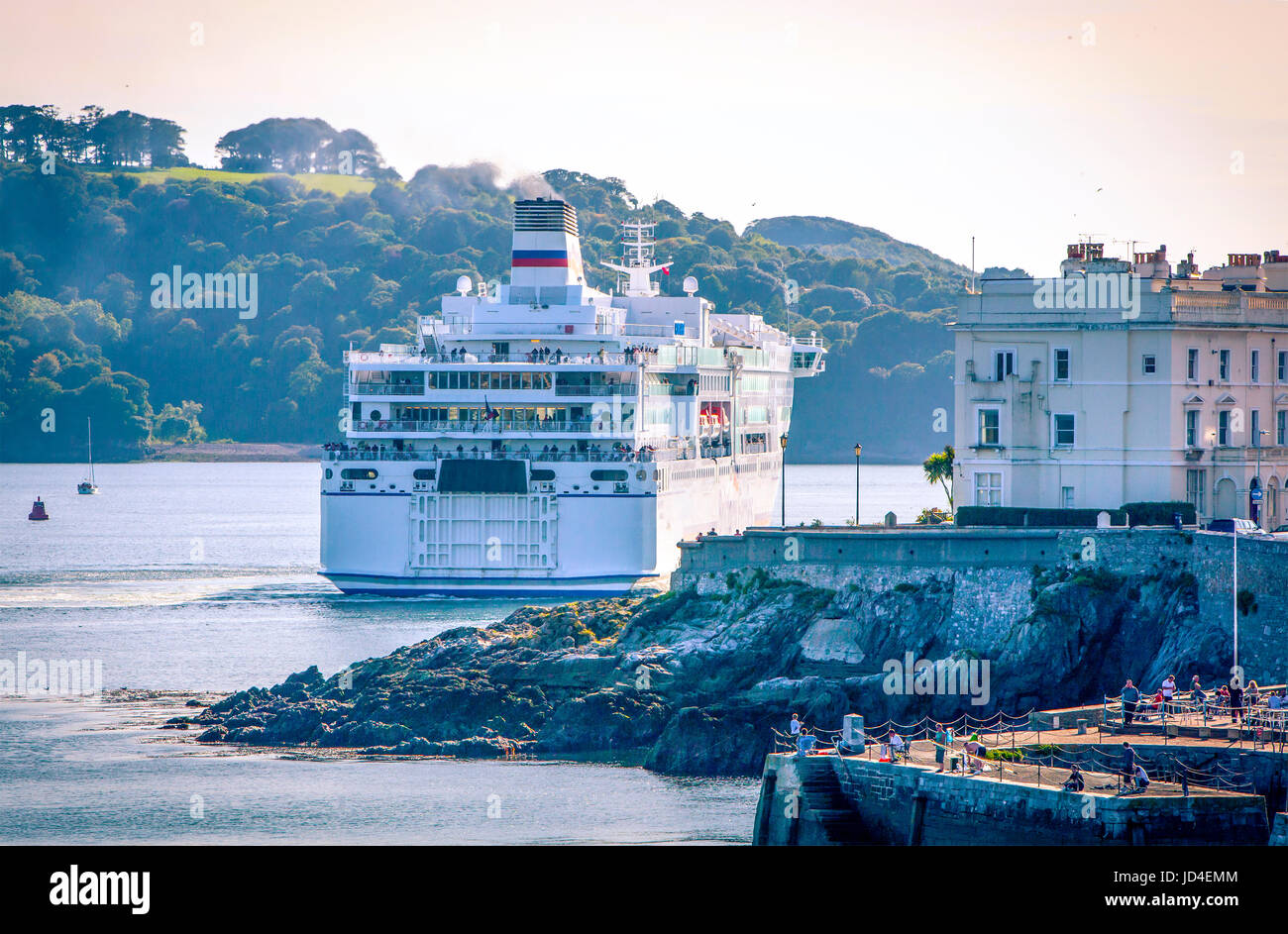 large Brittany Ferries ferry Pont Aven sailing into port with houses ...