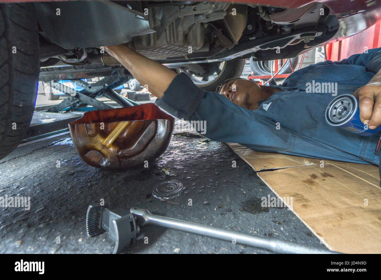 KUALA LUMPUR, 22 DEC 2016. Mechanic working in the car maintenence ...