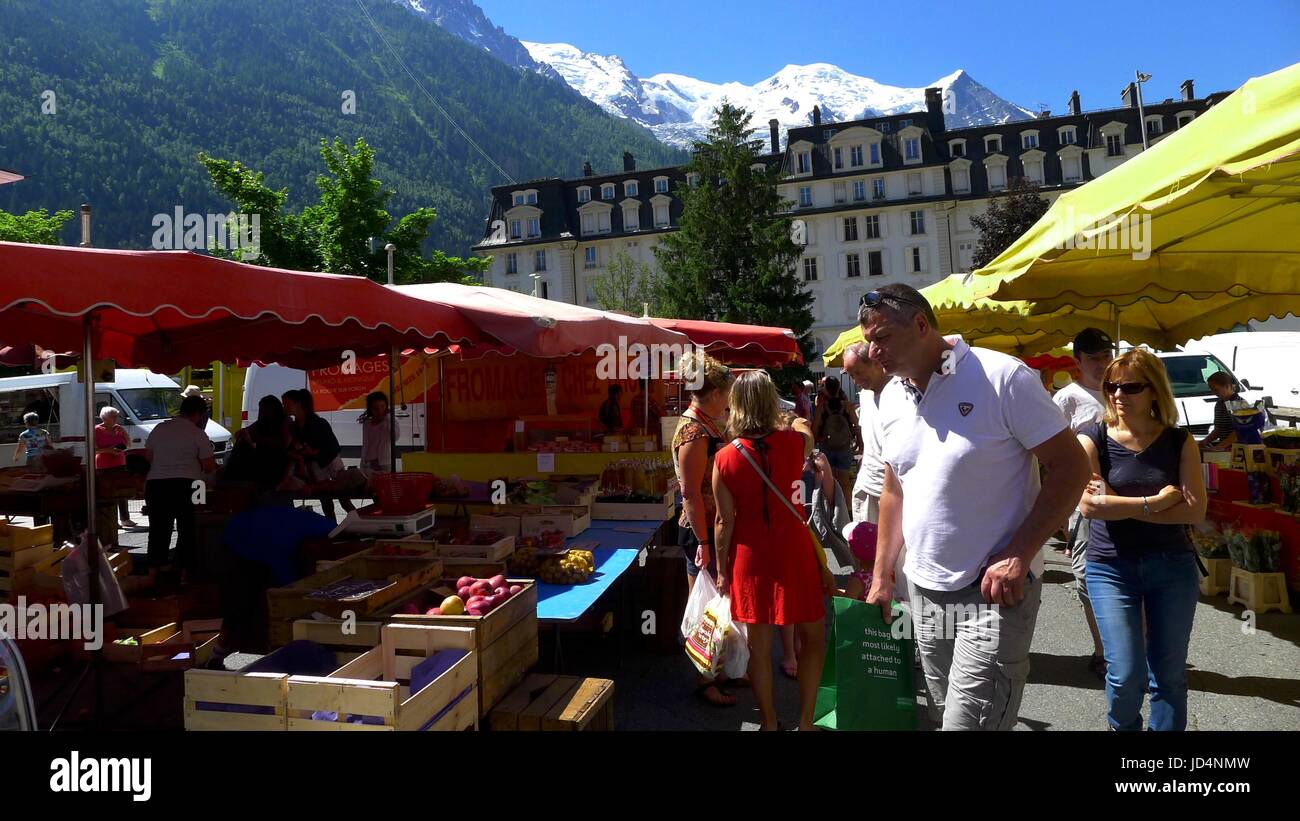 Tourists at traditional outdoor market, Chamonix, Mont Blanc, France ...