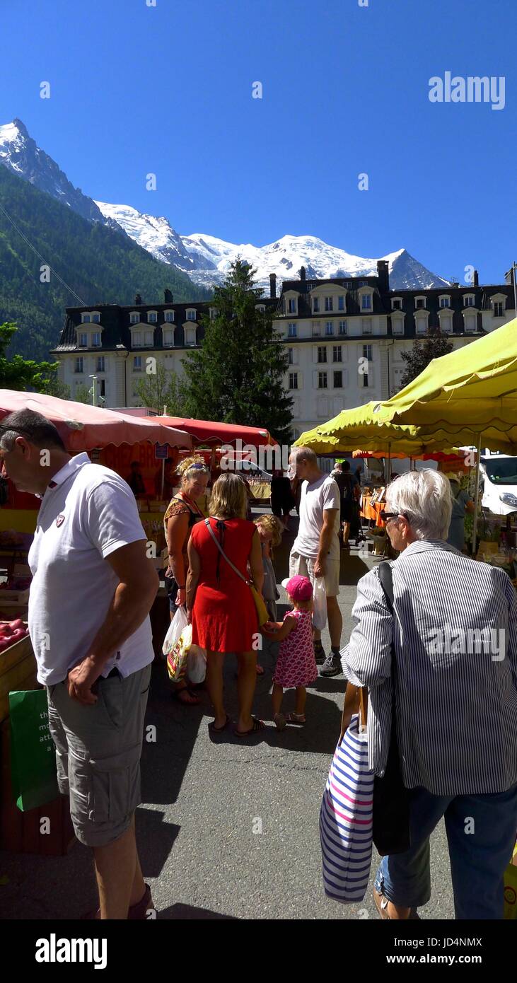 Tourists at traditional outdoor market, Chamonix, Mont Blanc, France ...