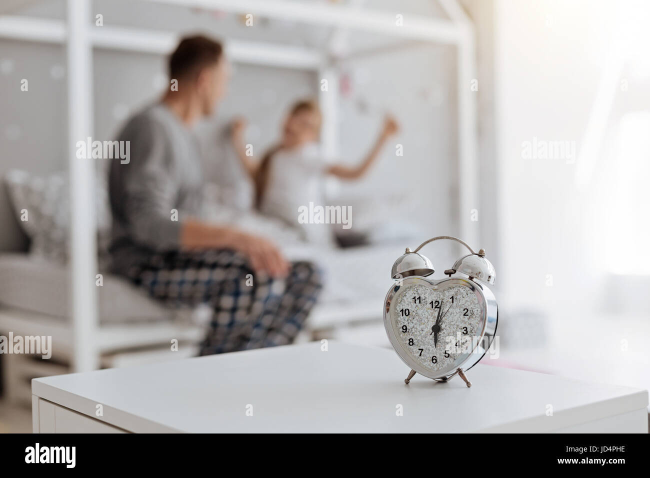 Active family waking up early in the morning Stock Photo - Alamy