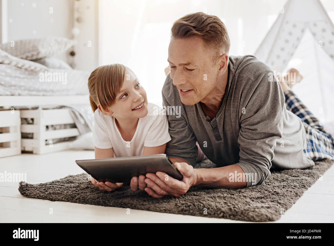 Inspiring intelligent man explaining something to his child Stock Photo ...