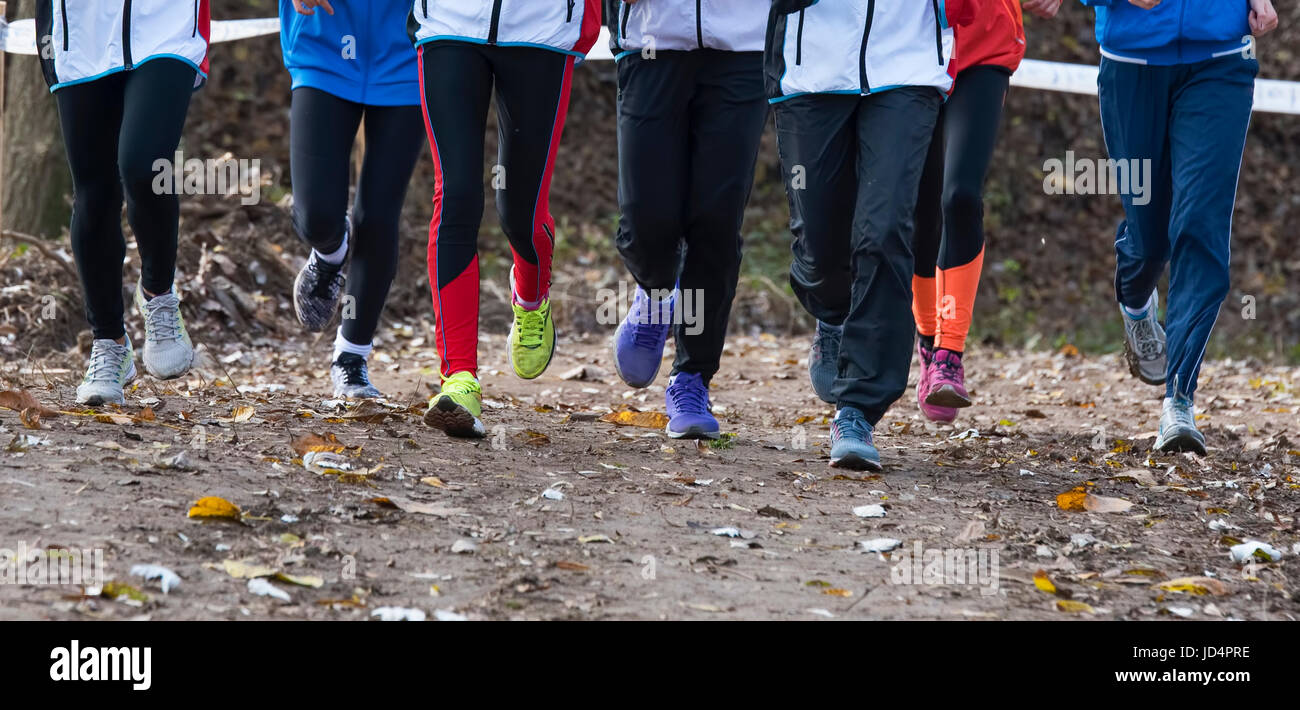 Athletes running around track hi-res stock photography and images - Alamy