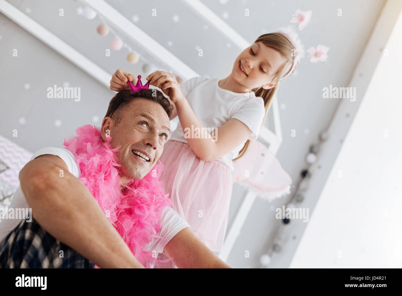Hilarious good dad acting like a princess Stock Photo - Alamy