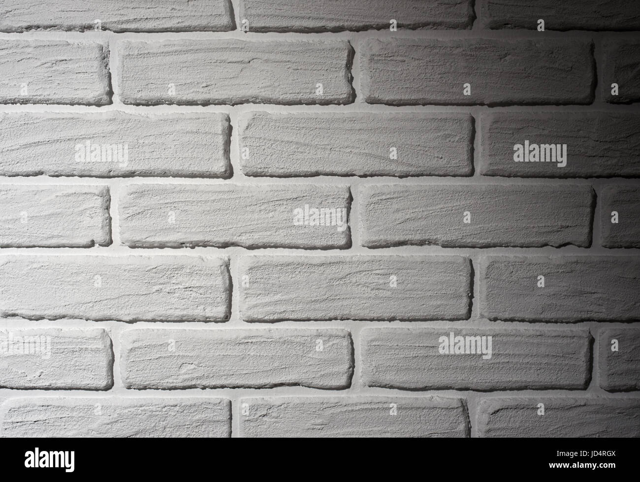 white brick wall with light effect and shadow, abstract background ...