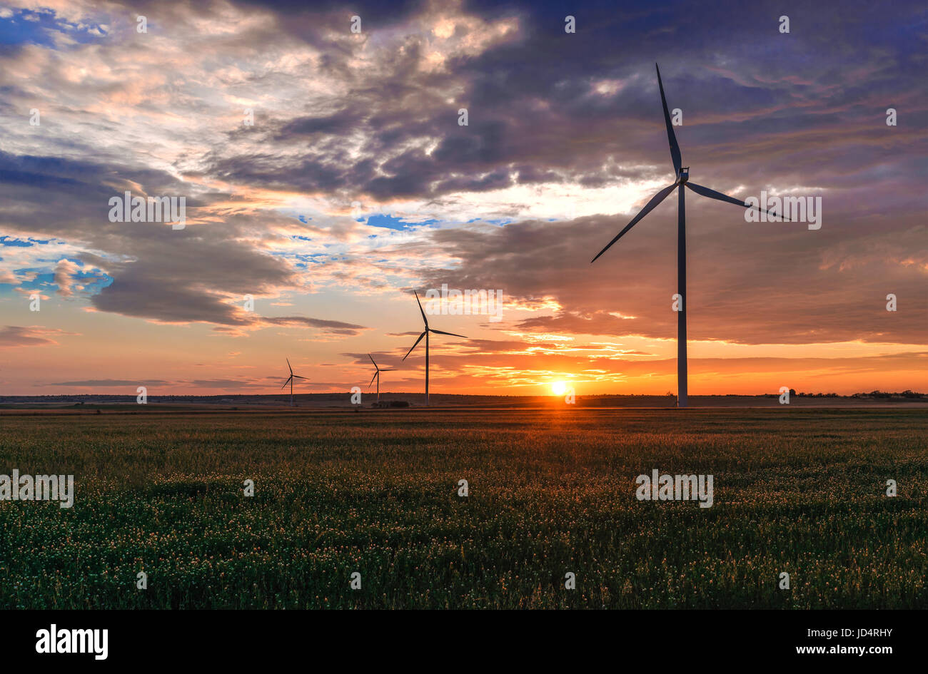 Puglia (Italy) - Wind farm with rock ruins, wind turbines and bales of ...