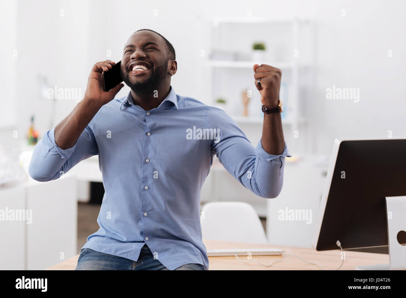 Joyful emotional man being happy Stock Photo - Alamy