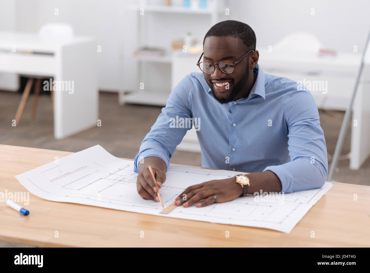 Engineer man building city drawing hi-res stock photography and images ...