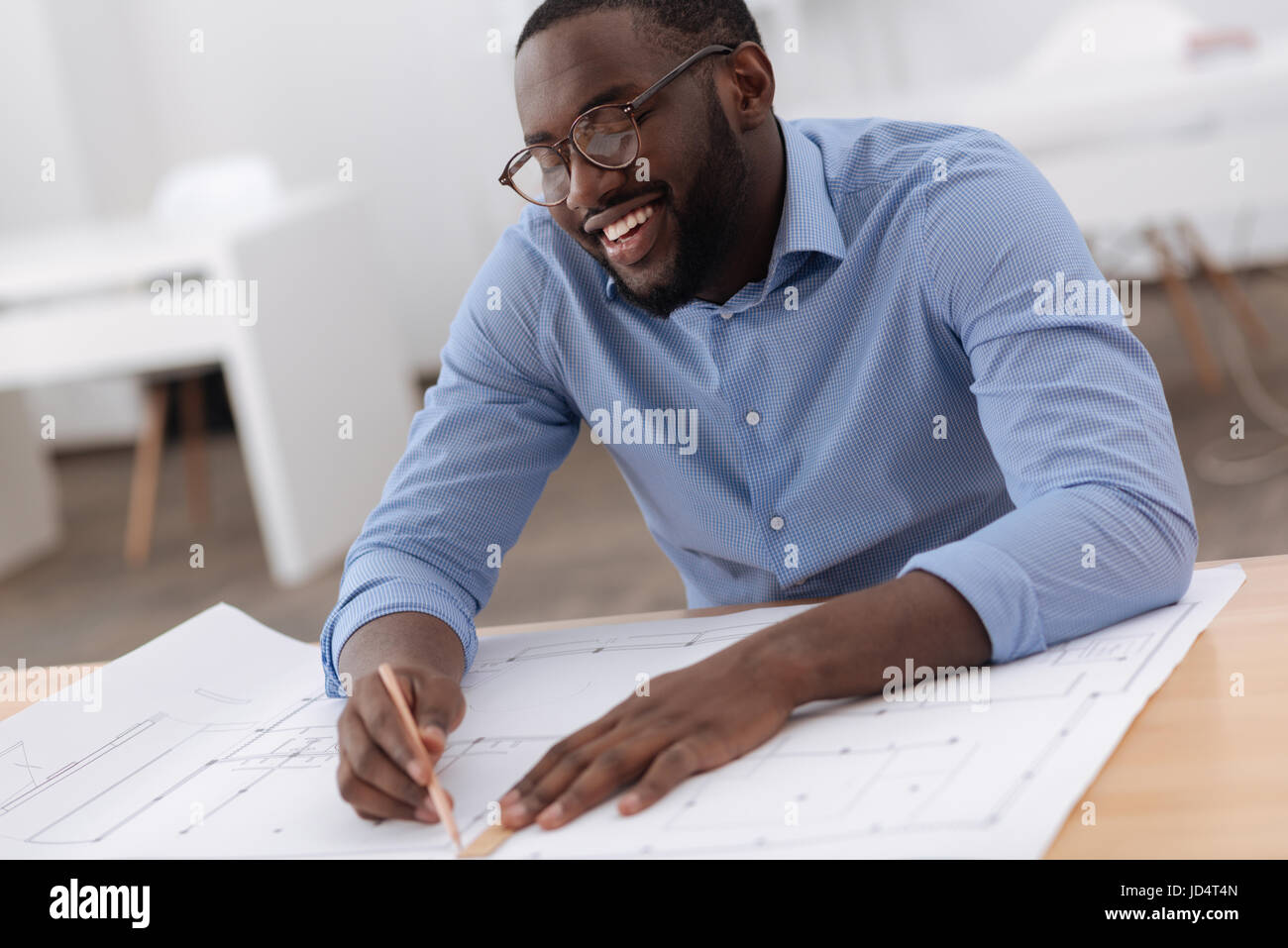 Engineer man building city drawing hi-res stock photography and images ...