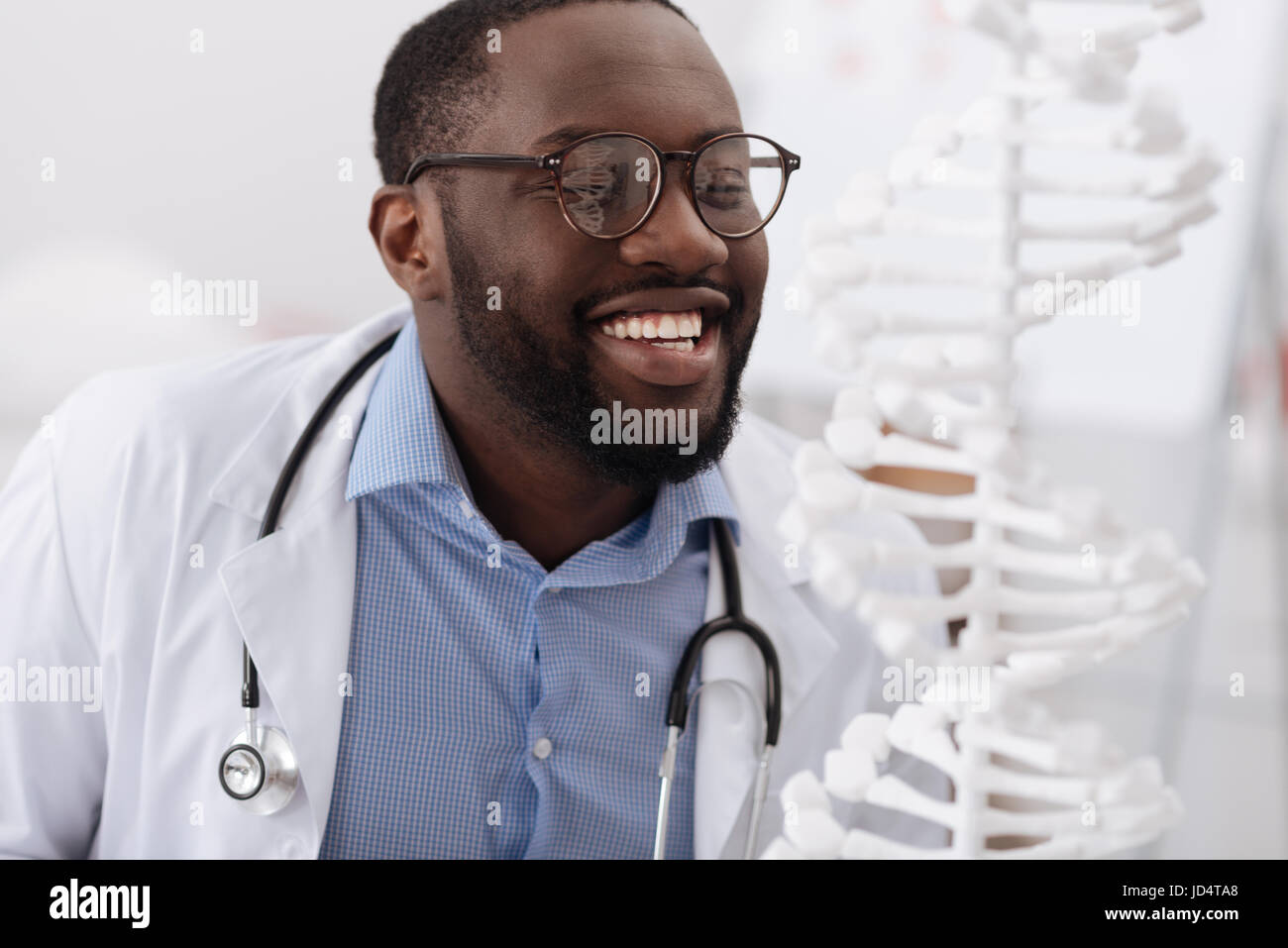Joyful delighted scientist smiling Stock Photo - Alamy