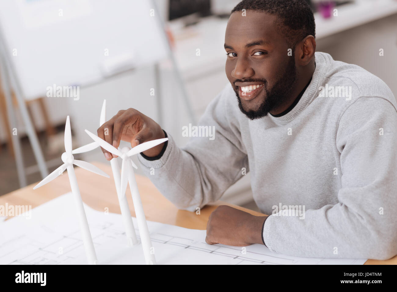 Happy smart man saving the environment Stock Photo - Alamy