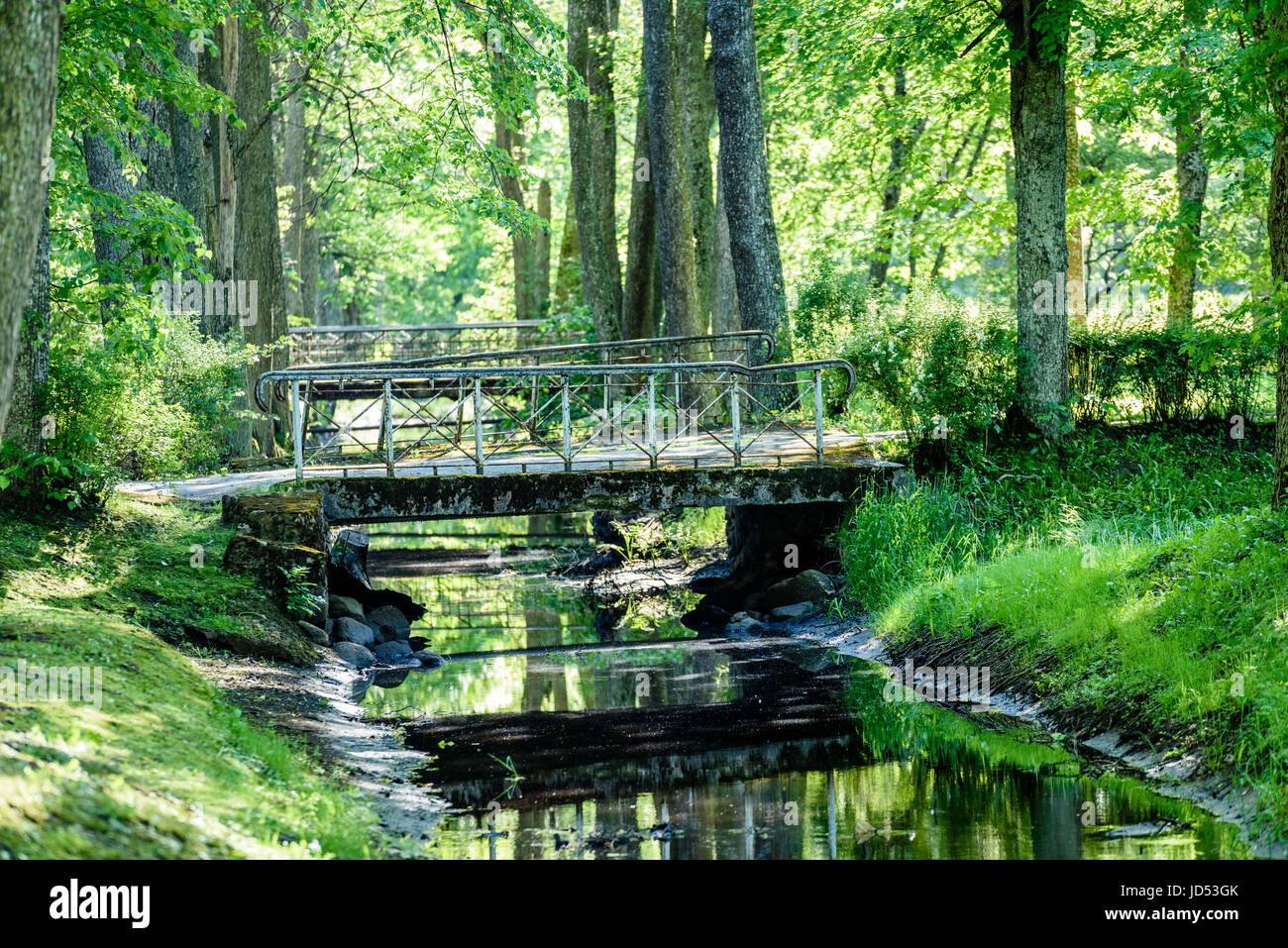 green park with walkways, bridges and old buildings Stock Photo - Alamy