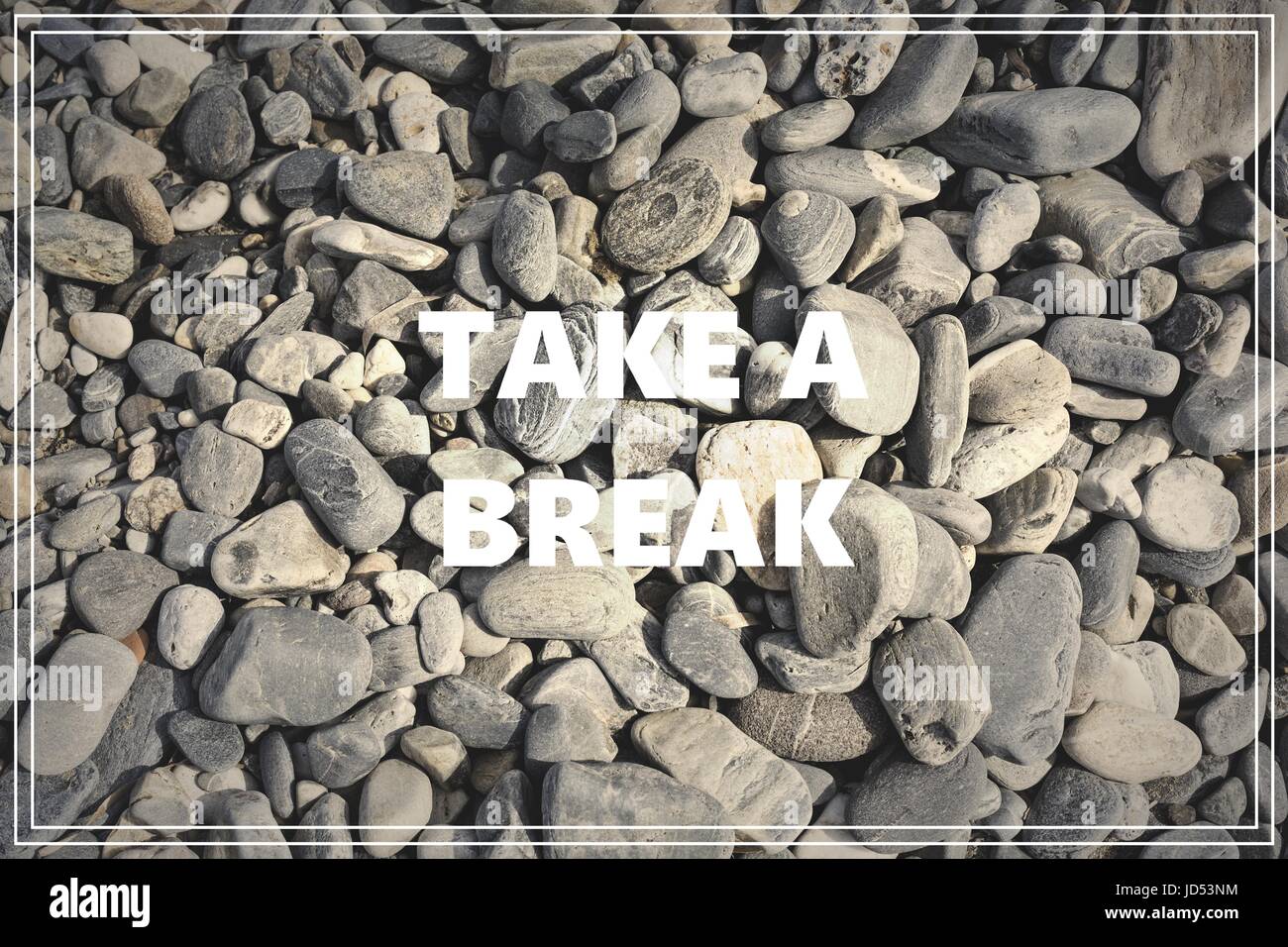 Word Take a Break. Sea stones as background Stock Photo - Alamy