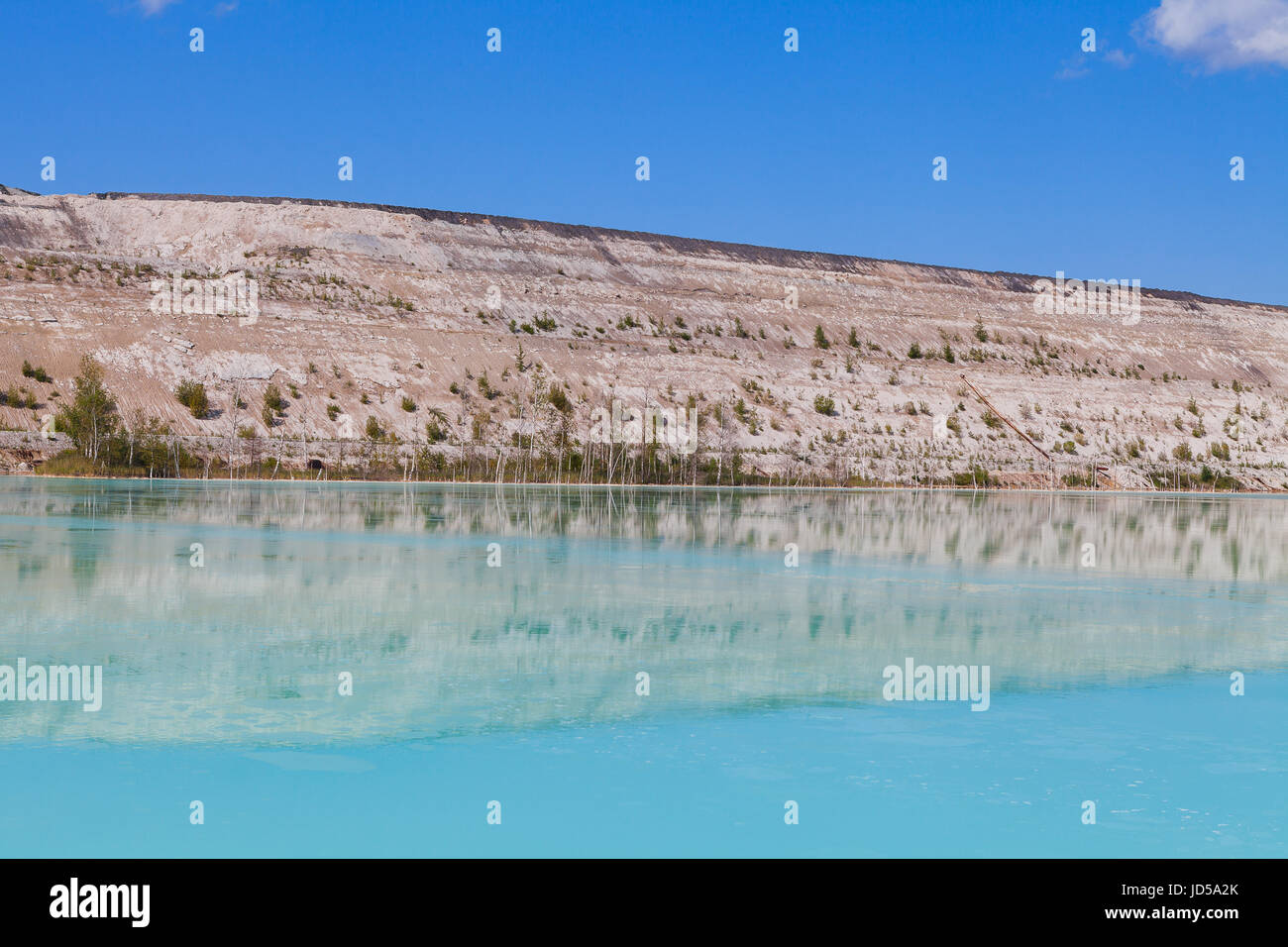Amazing color of artificial lake and ash dunes of power plant waste ...