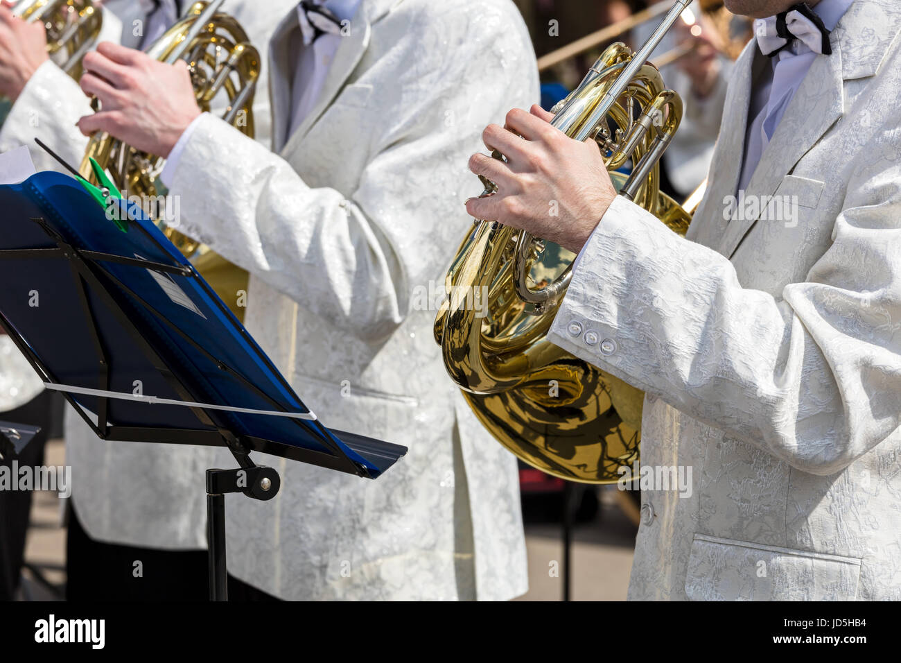 Men blowing horns hi-res stock photography and images - Alamy
