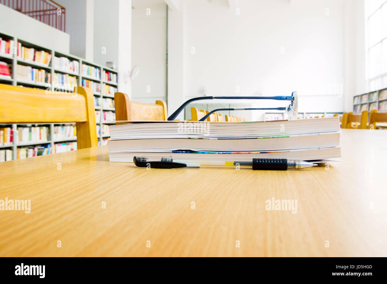 Library shelves, a large number of books Stock Photo - Alamy