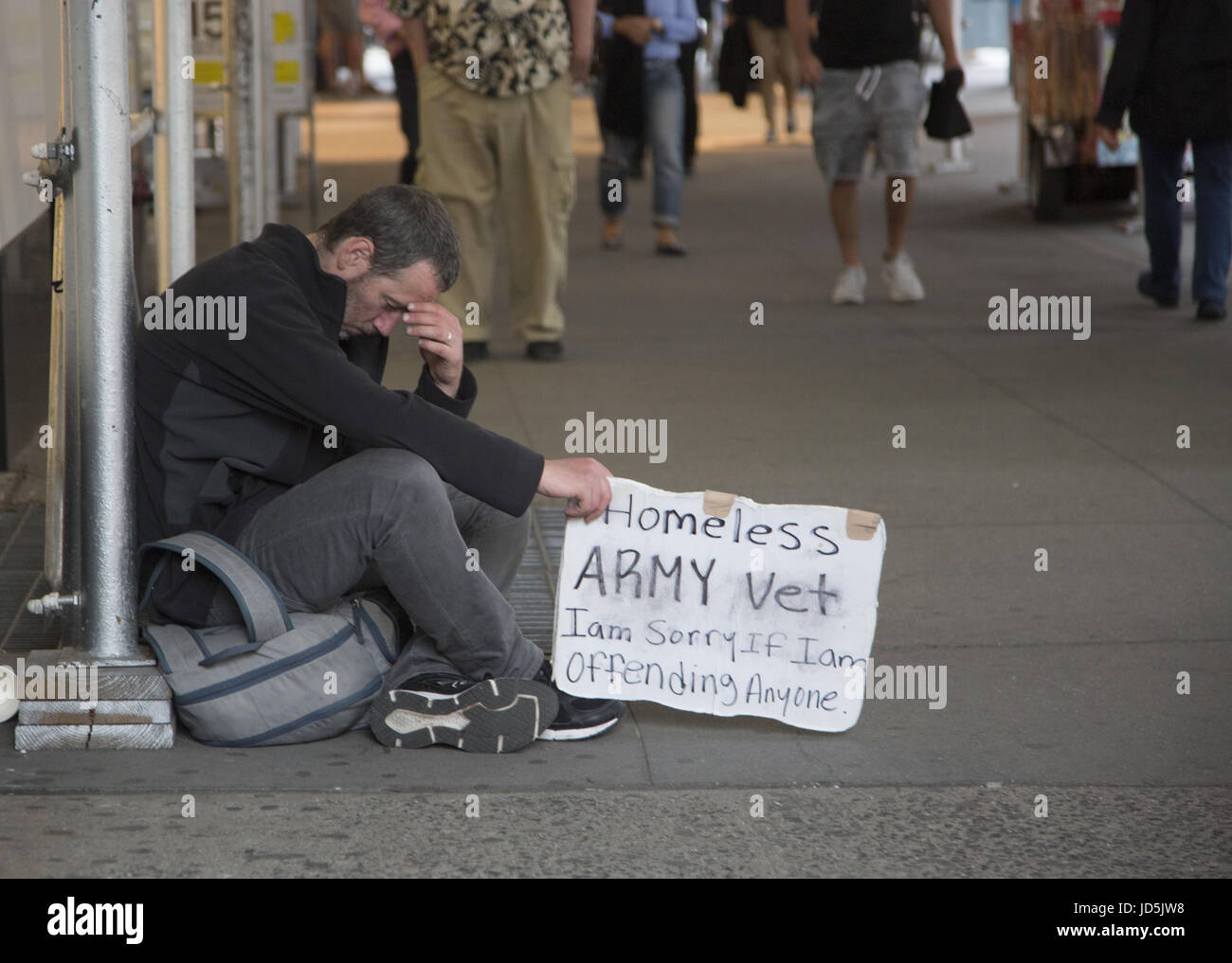 Army veteran depressed and on the street begging in midtown Manhattan ...