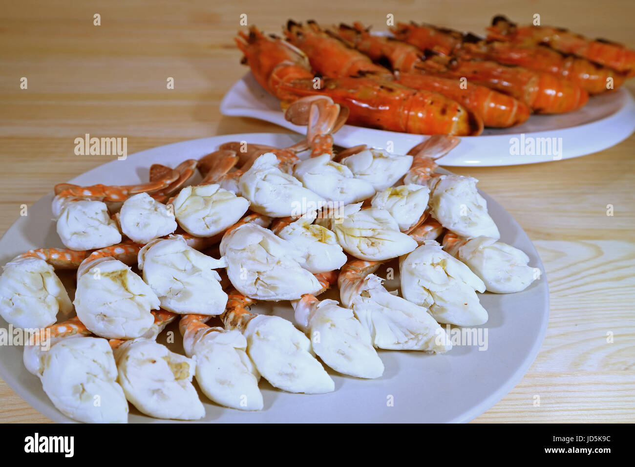 Steamed Blue Crab Legs and Grilled Whole River Prawns Served on White ...