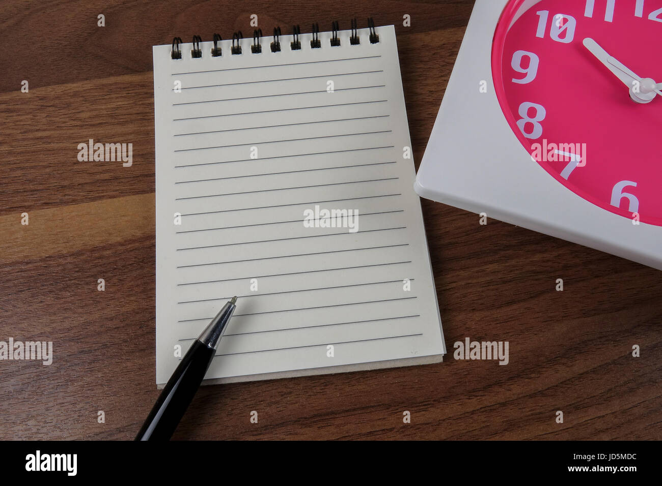 ime management conceptual,book,pen and clock on wood Stock Photo - Alamy