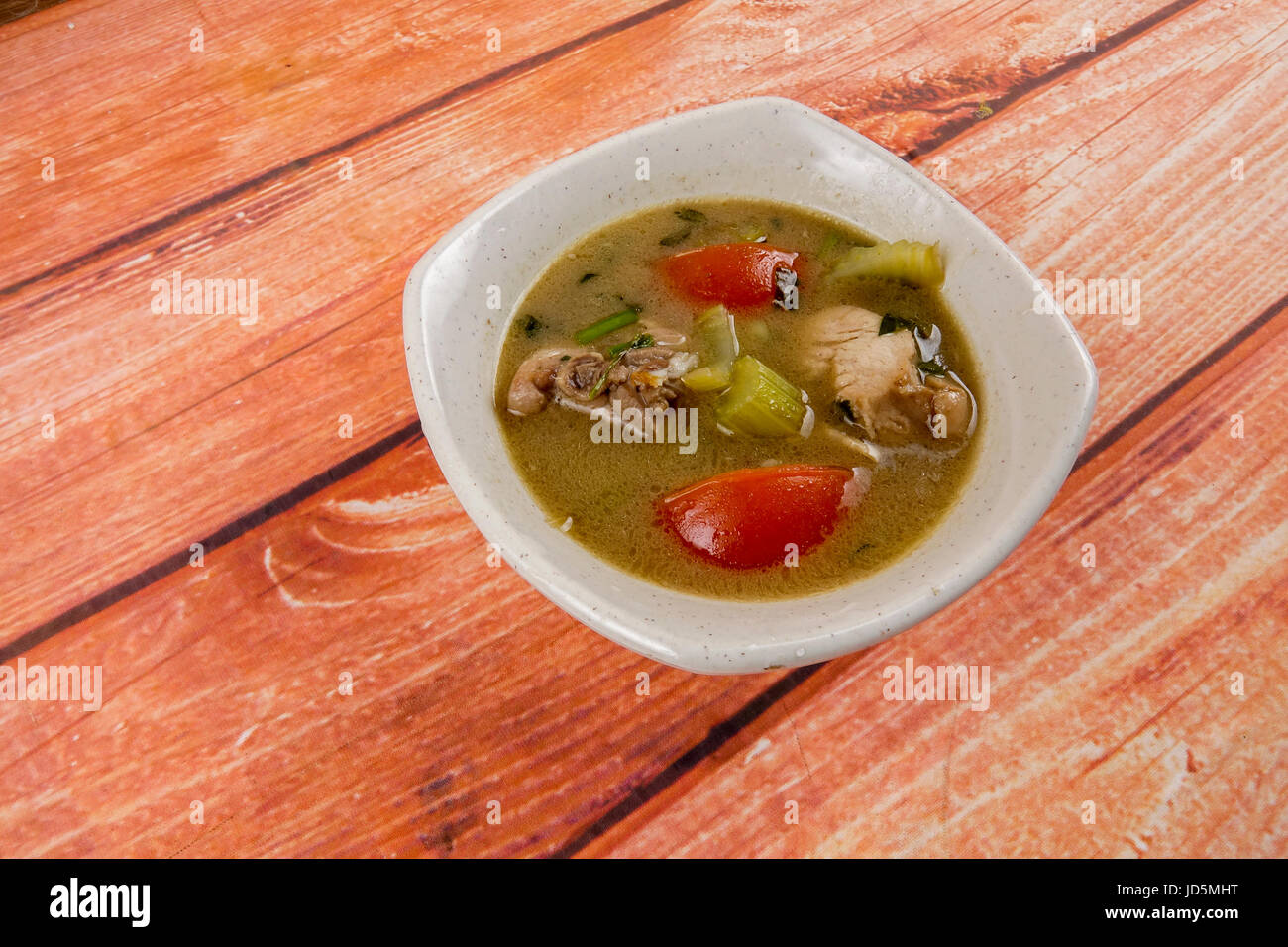 Chicken soup on wooden table. Top View Stock Photo - Alamy
