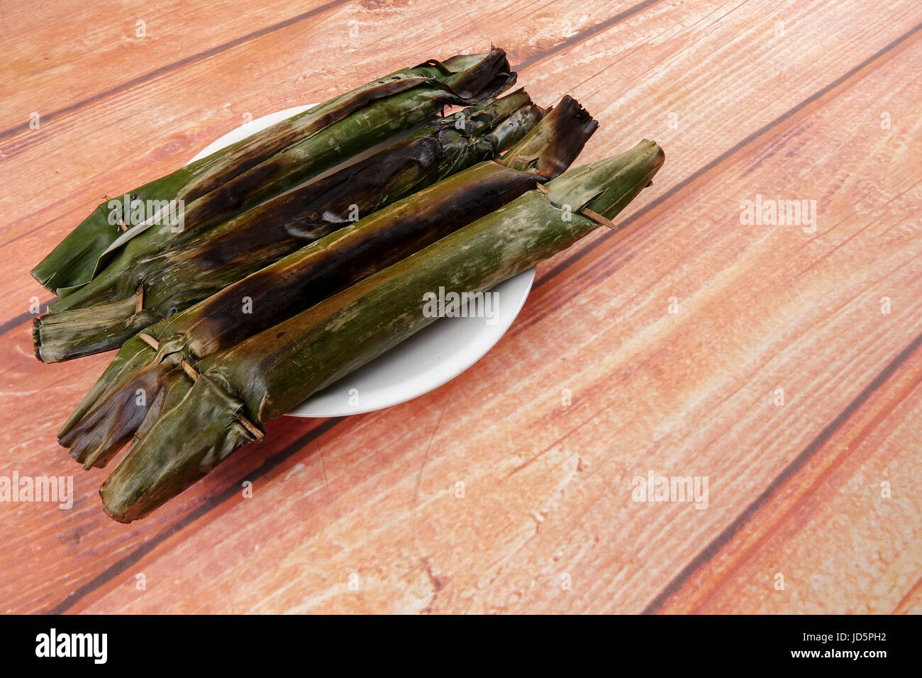 Pulut panggang or grilled glutinous rice package, Malay or Nonya ...