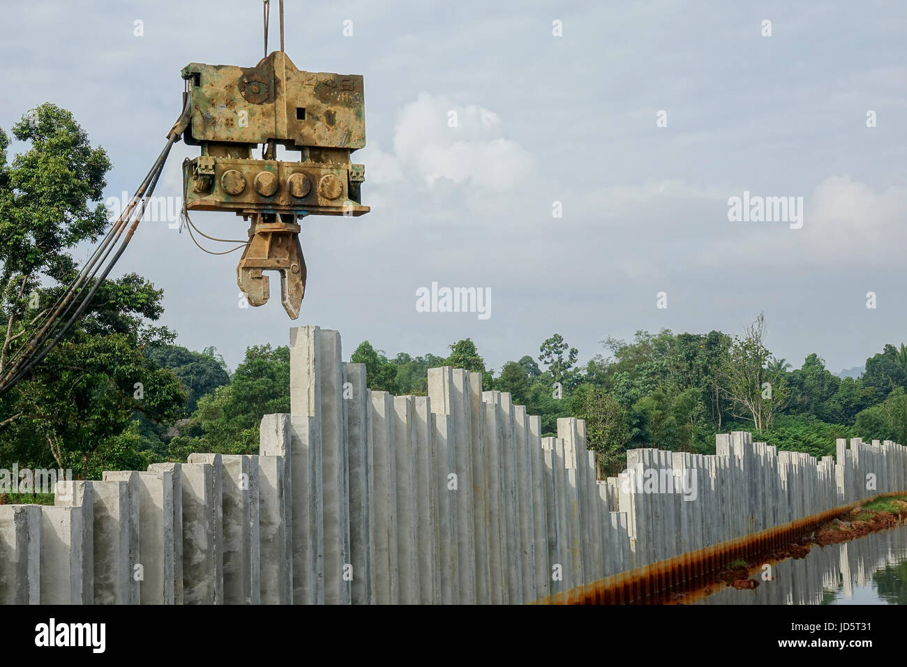 Piling machine works on a bridge pile construction Stock Photo - Alamy